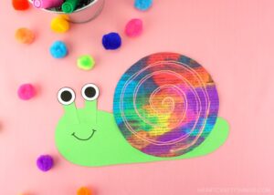 Colorful Newspaper Snail Craft - I Heart Crafty Things