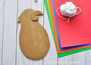 Colorful And Fun Twirling Parrot Craft - I Heart Crafty Things
